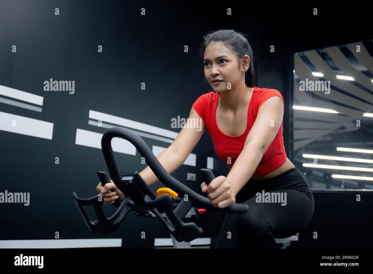 Girl riding fitness machine in hi-res stock photography and images - Alamy