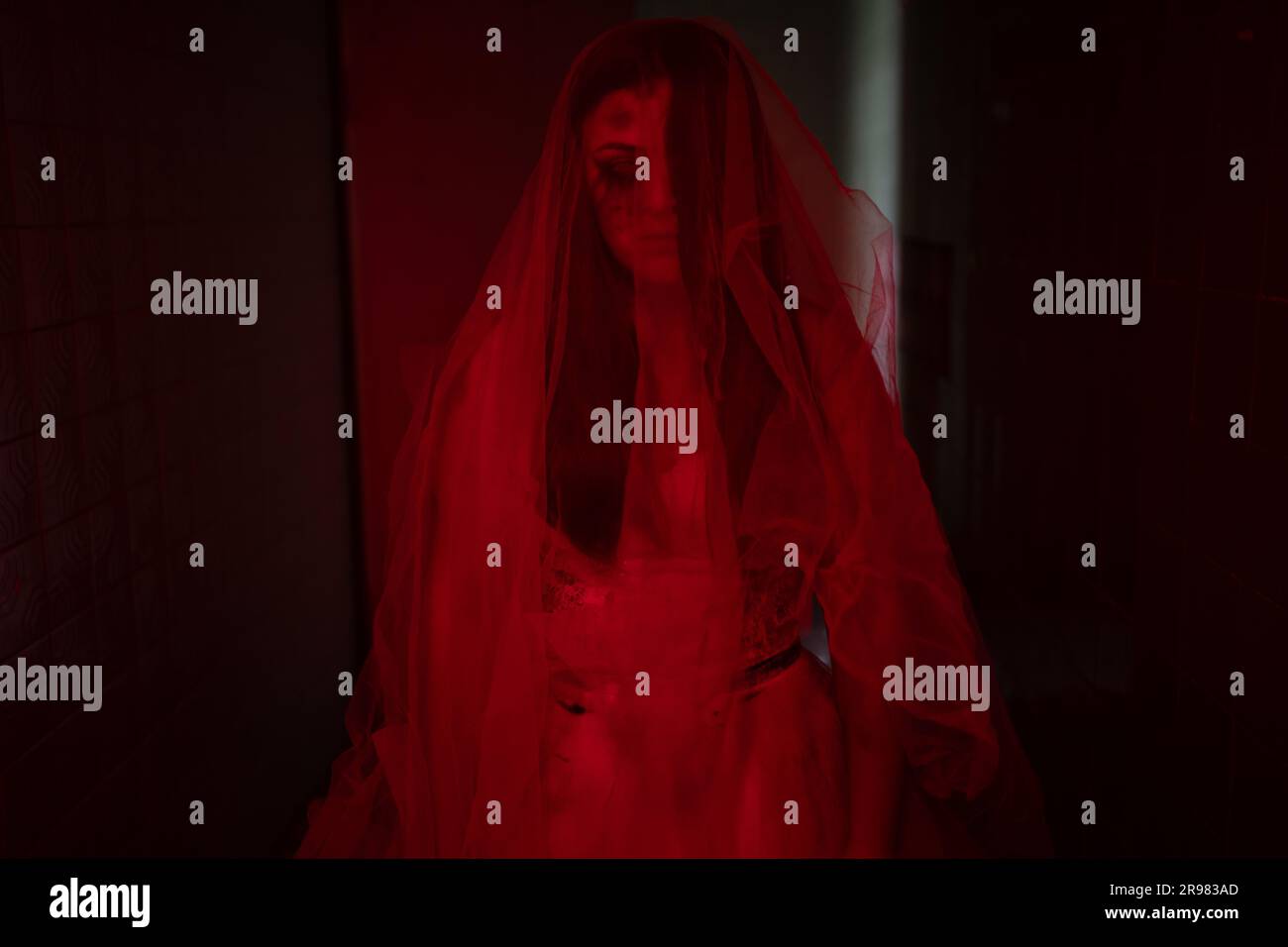 Horror scene of a possessed bride. Woman in white dress ghost zombie ...