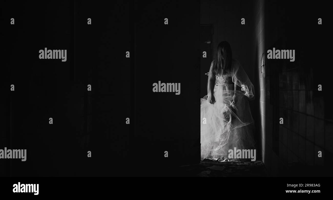 Horror scene of a possessed zombie bride, woman in white dress ghost ...