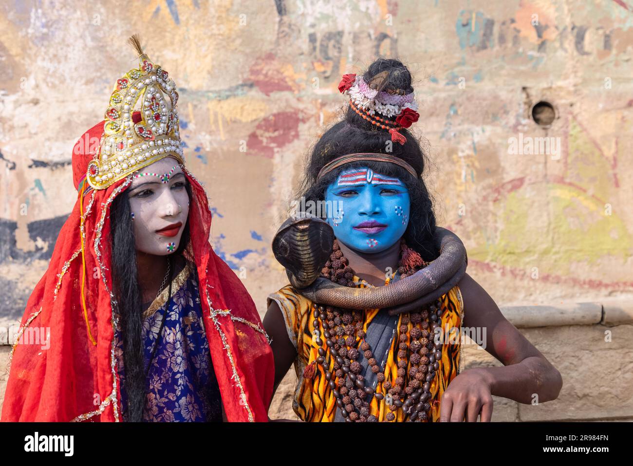 Portrait of a young boy dress up like lord shiva and goddess parvati ...