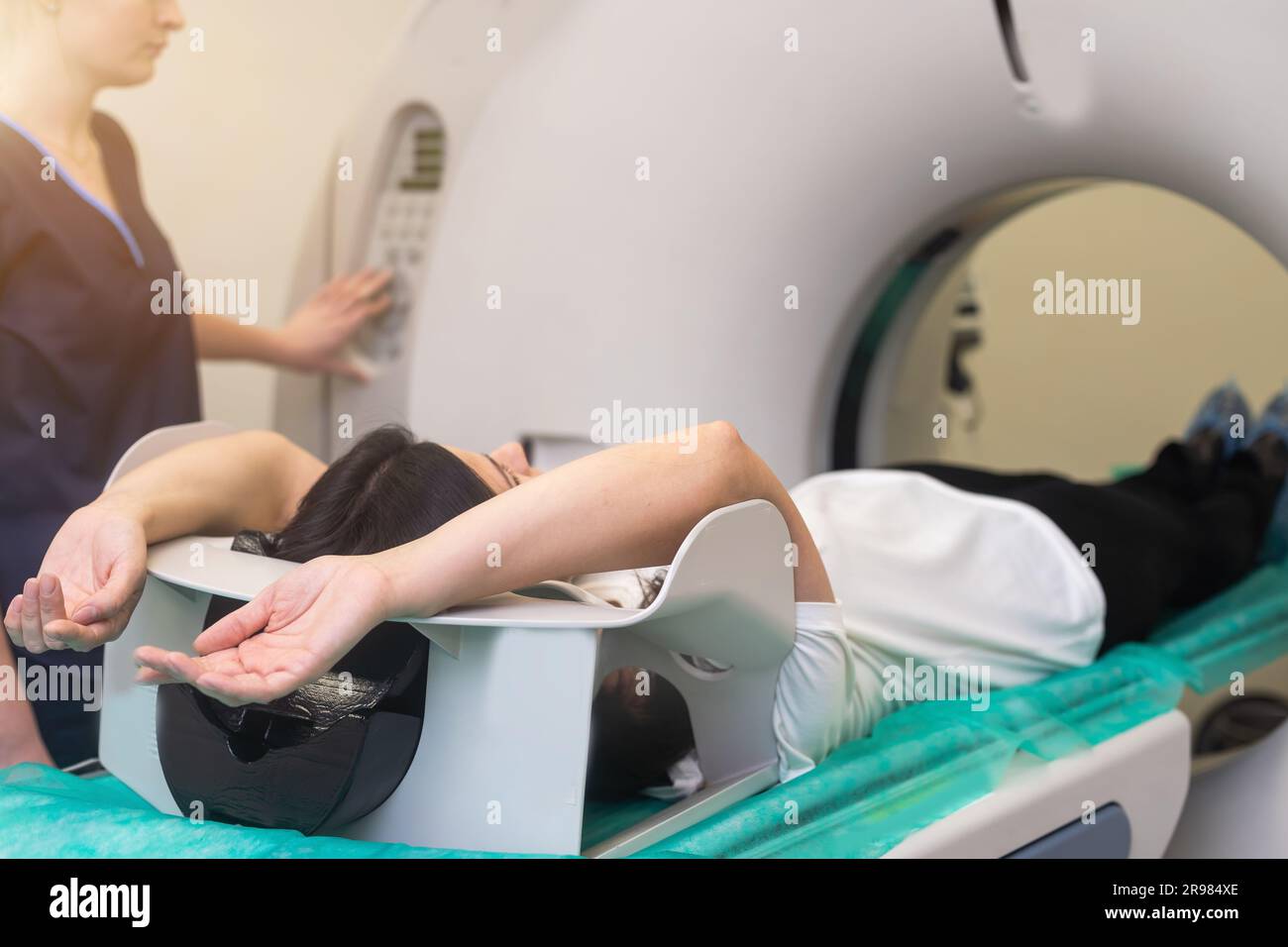 Doctor doing computed tomography for female patient stock photo ...