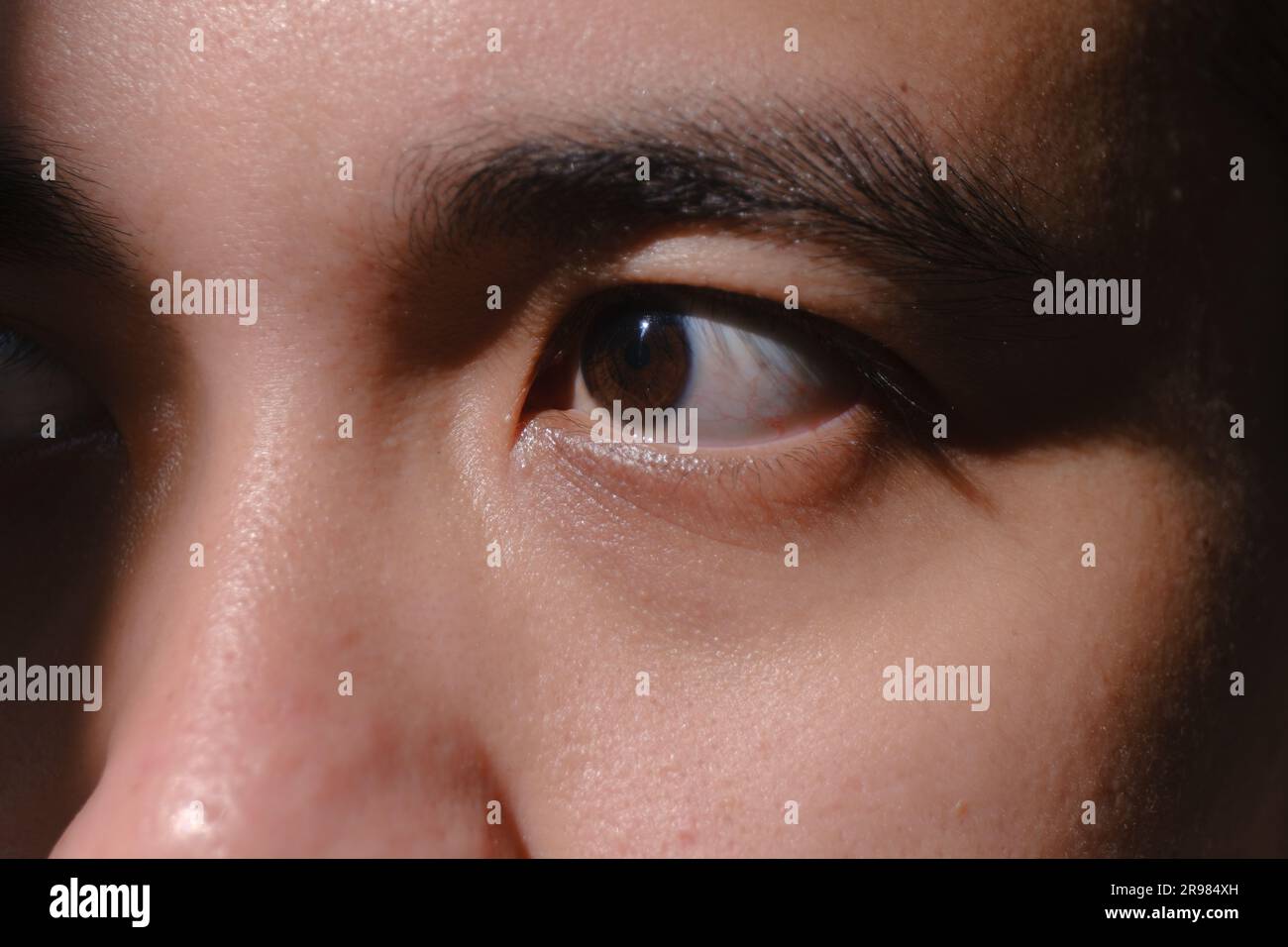 Man face looking up close up shadow hi-res stock photography and images ...