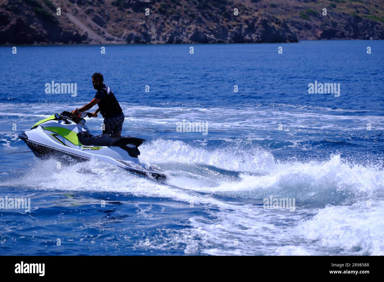 Man riding a jet ski hi-res stock photography and images - Alamy