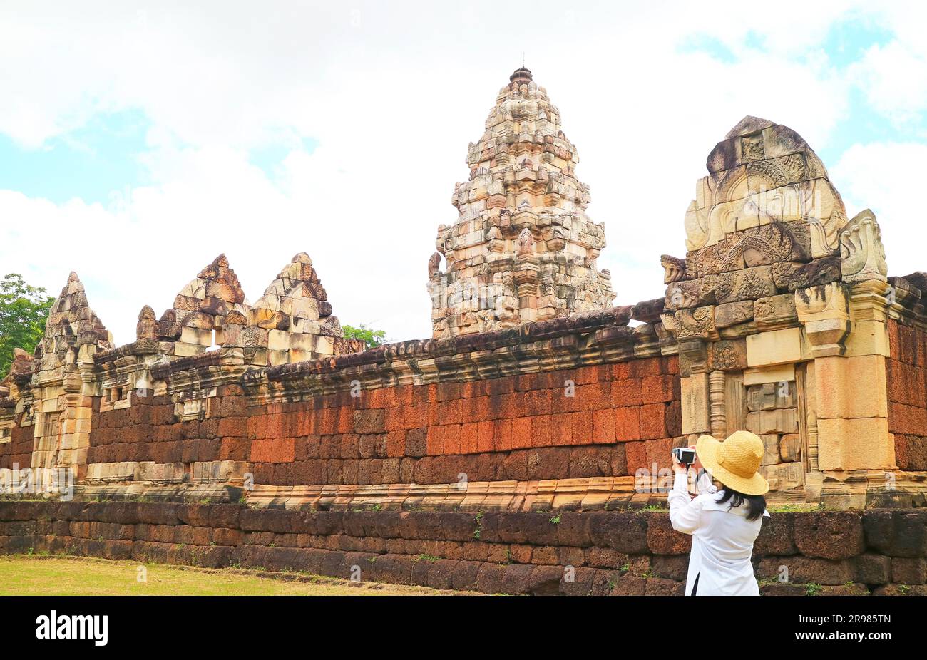 Female Traveler Taking Photos of Prasat Sdok Kok Thom Khmer Temple ...