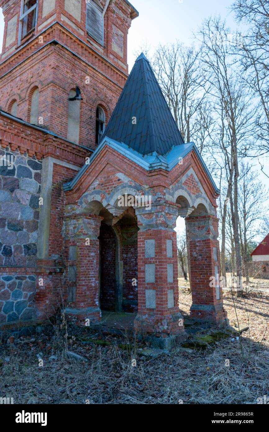 beautiful spring landscape with ruins of an old church, former ...