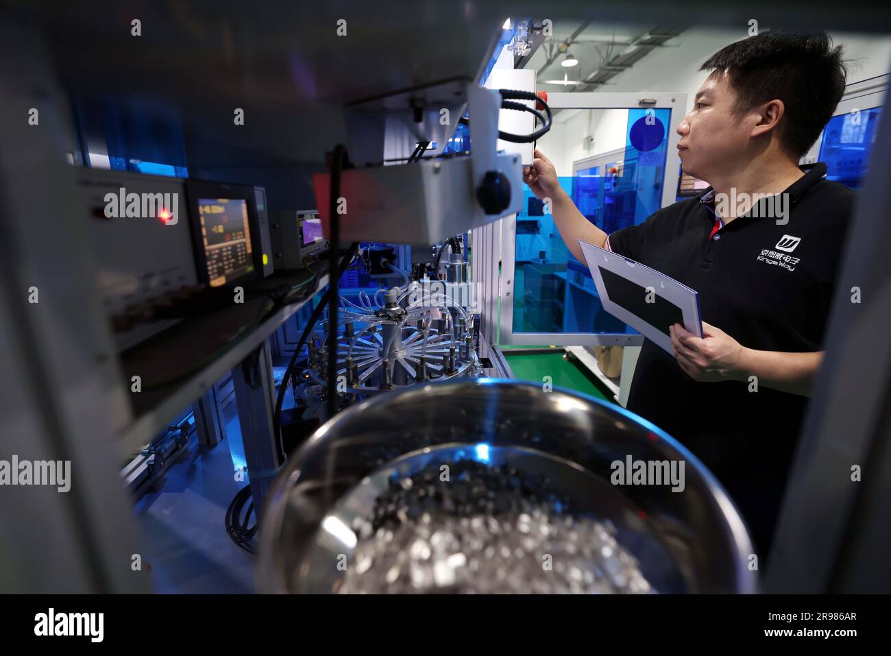 HEFEI, CHINA - JUNE 25, 2023 - A staff member works on an integrated ...