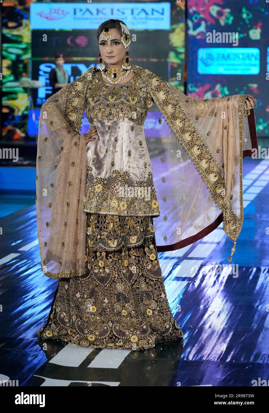 A model presents creations by Pakistani designer My Apparels during a ...