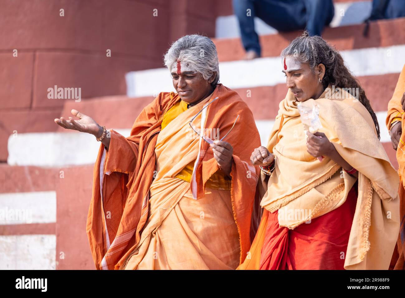 Portrait of Unidentified Indian holy sadhu female walking at kedar ghat ...