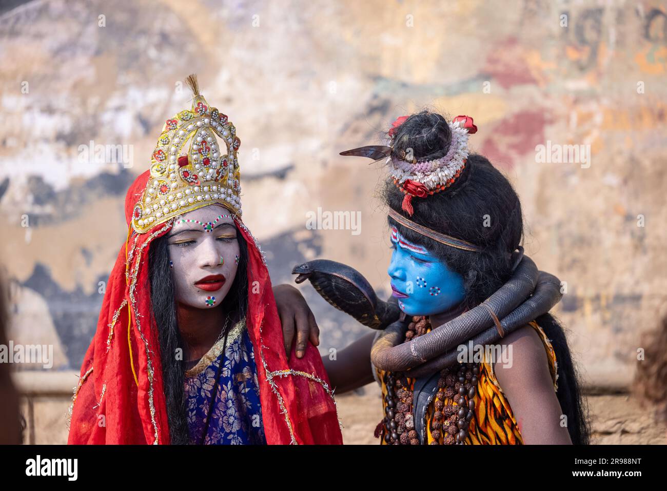 Portrait of a young boy dress up like lord shiva and goddess parvati ...