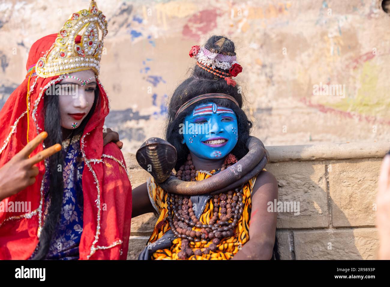 Portrait of a young boy dress up like lord shiva and goddess parvati ...