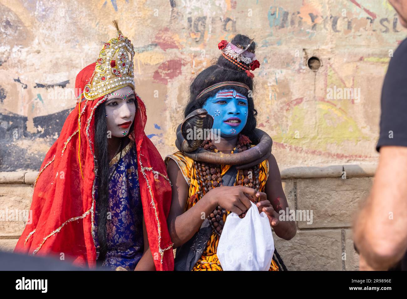 Portrait of a young boy dress up like lord shiva and goddess parvati ...