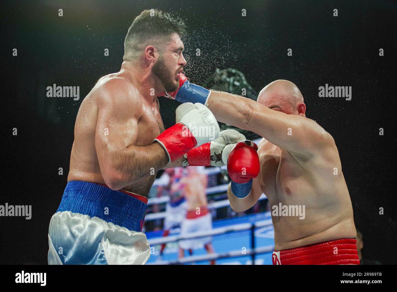 NEW YORK, NY- JUNE 24: (R-L) Adam Kownacki punches Joe Cusumano in ...