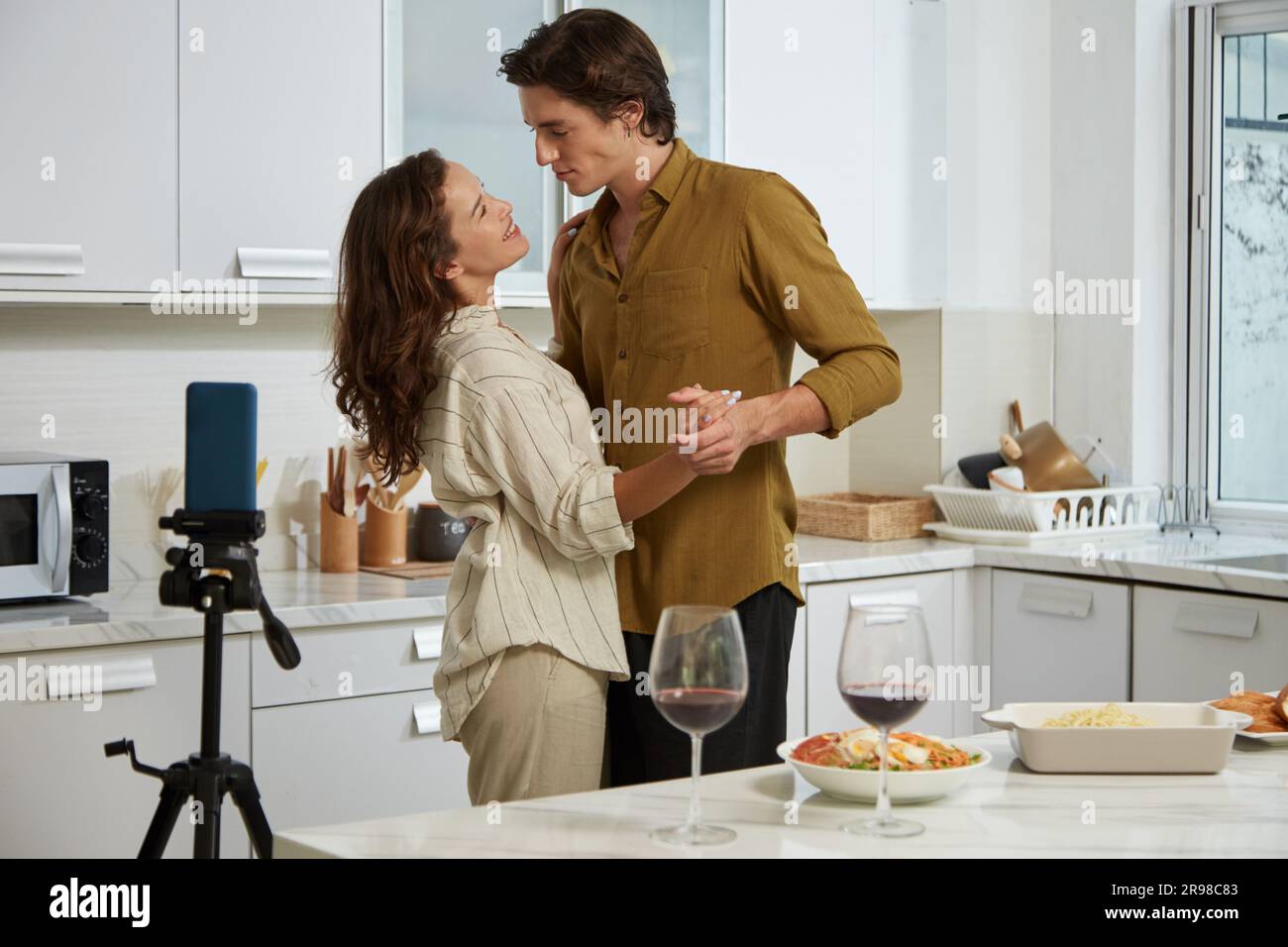 Young couple filming themselves hi-res stock photography and images - Alamy