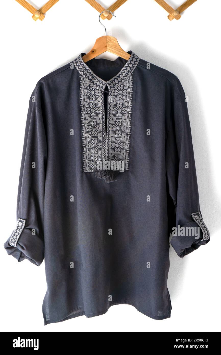 Ukrainian clothes embroidered man shirt. Blue gray and black threads ...