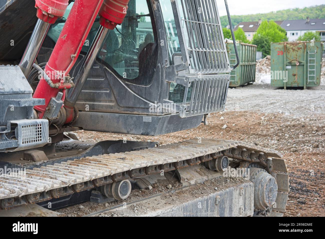 demolition of a building with excavators and construction machinery ...