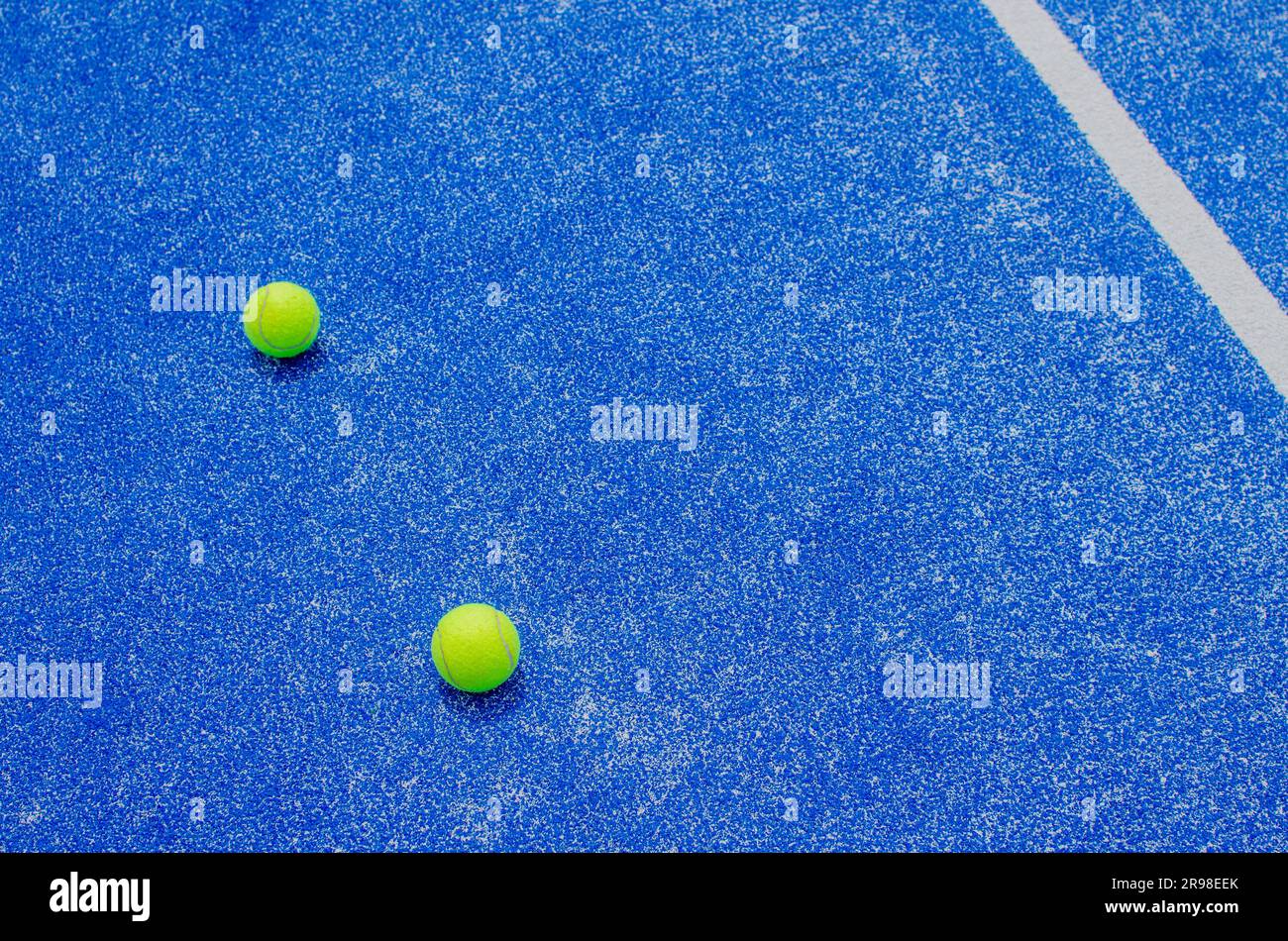 two balls on a paddle tennis court, racket sports Stock Photo - Alamy