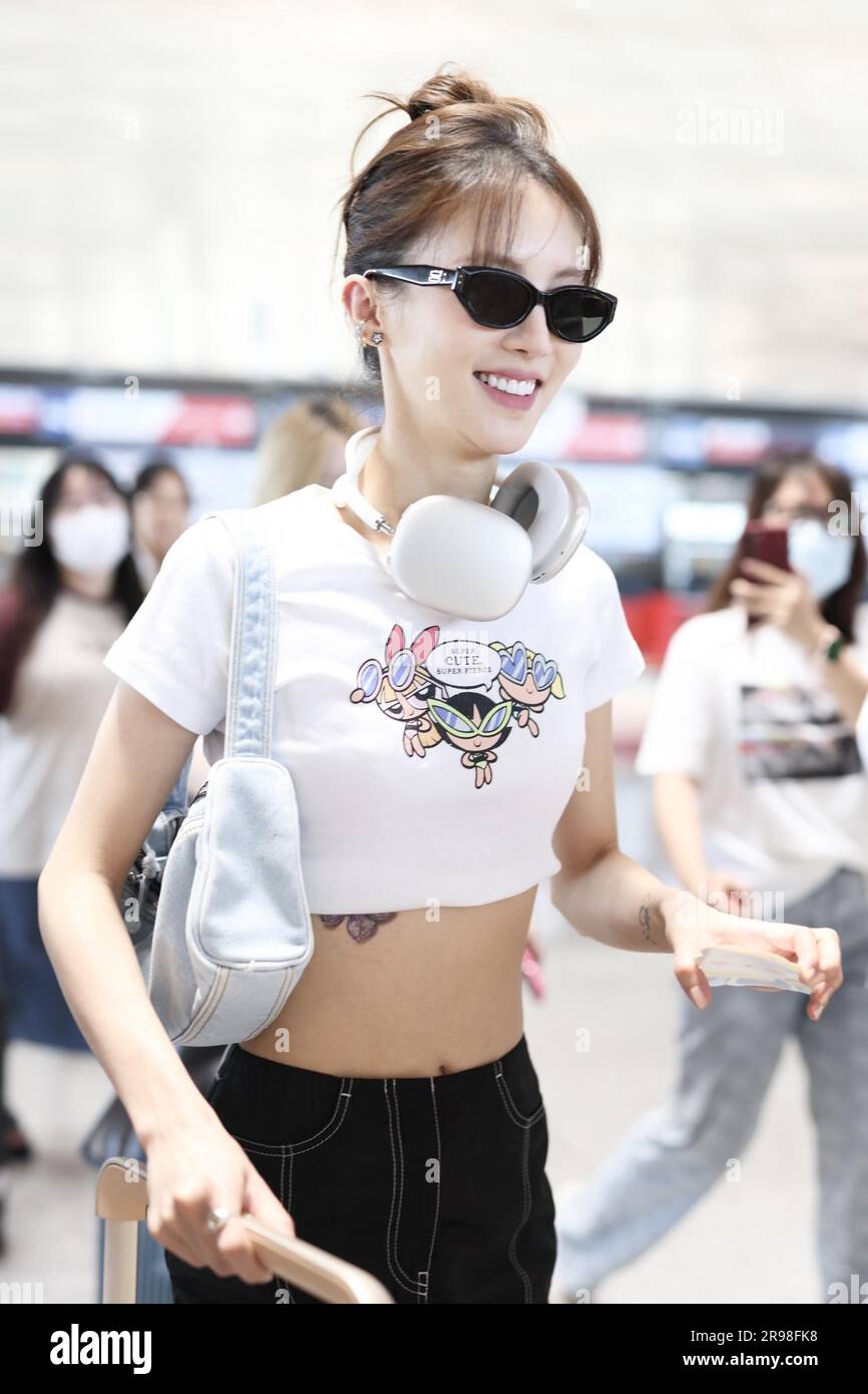 Chinese actress Gina Jin appears at airport in Beijing, China. 22nd ...