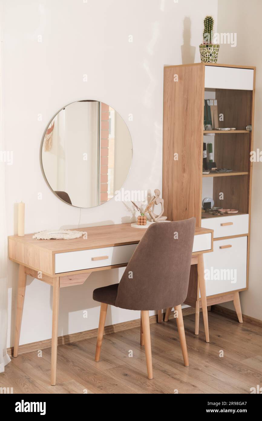modern interior of bedroom, dressing table with mirror and soft ...