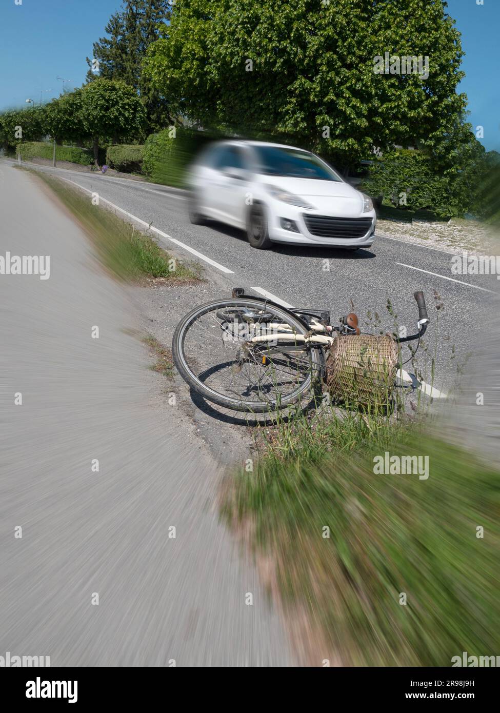 Accident with bicycle and car in speed on highway. No people. Zoom ...