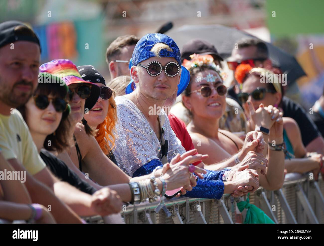 Elton John fan Thomas Lewis (centre), aged 22, from Basingstoke ...