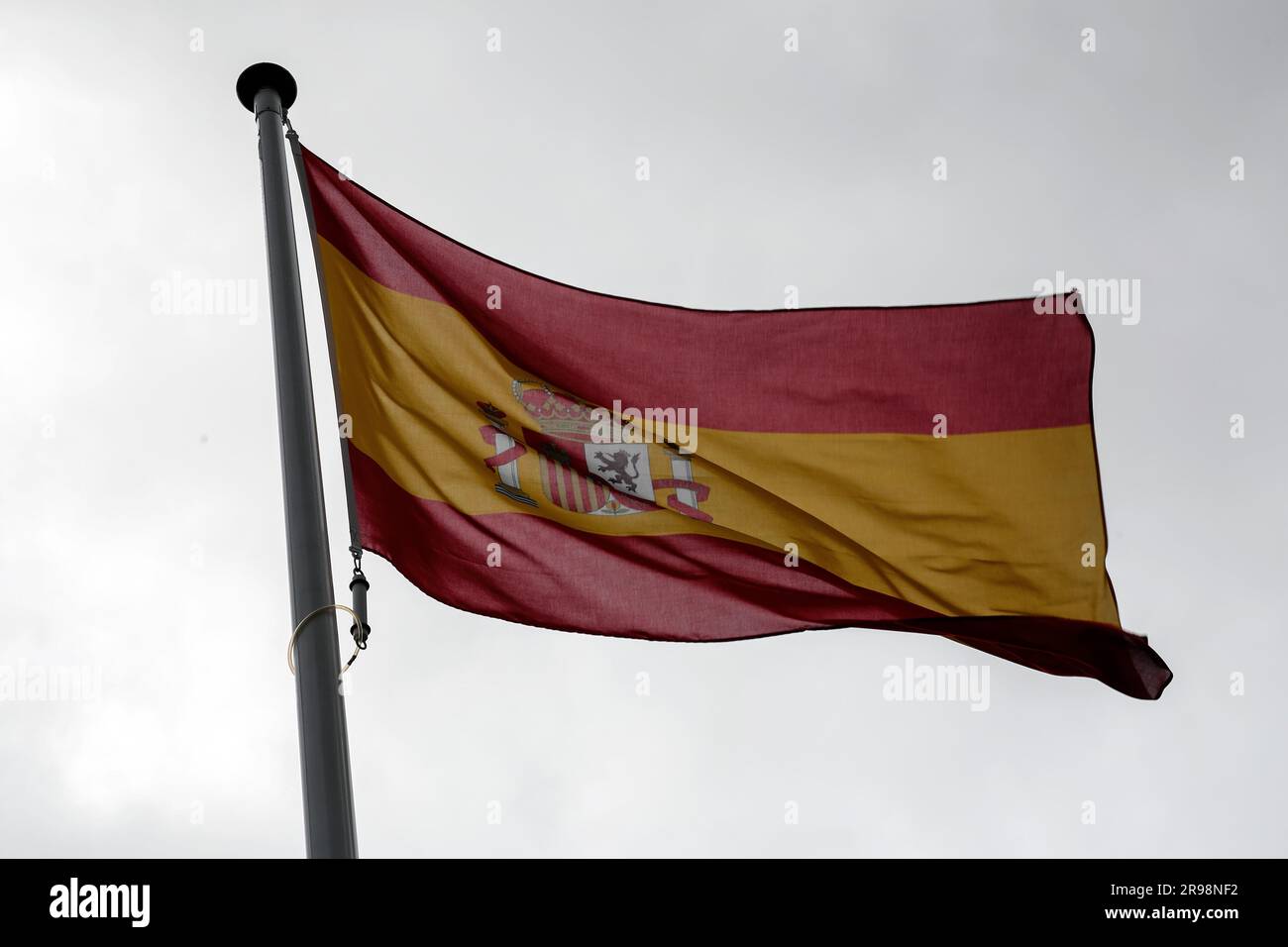 Spanish national flag waving in the sky Stock Photo - Alamy
