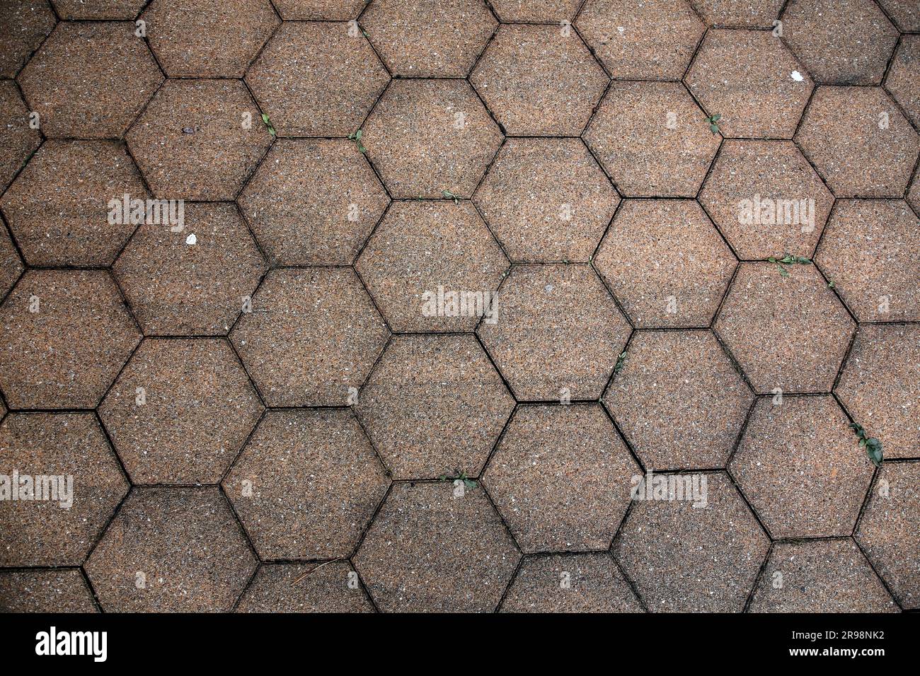 Street pavement with hexagonal polyhedron blocks, urban texture with a ...