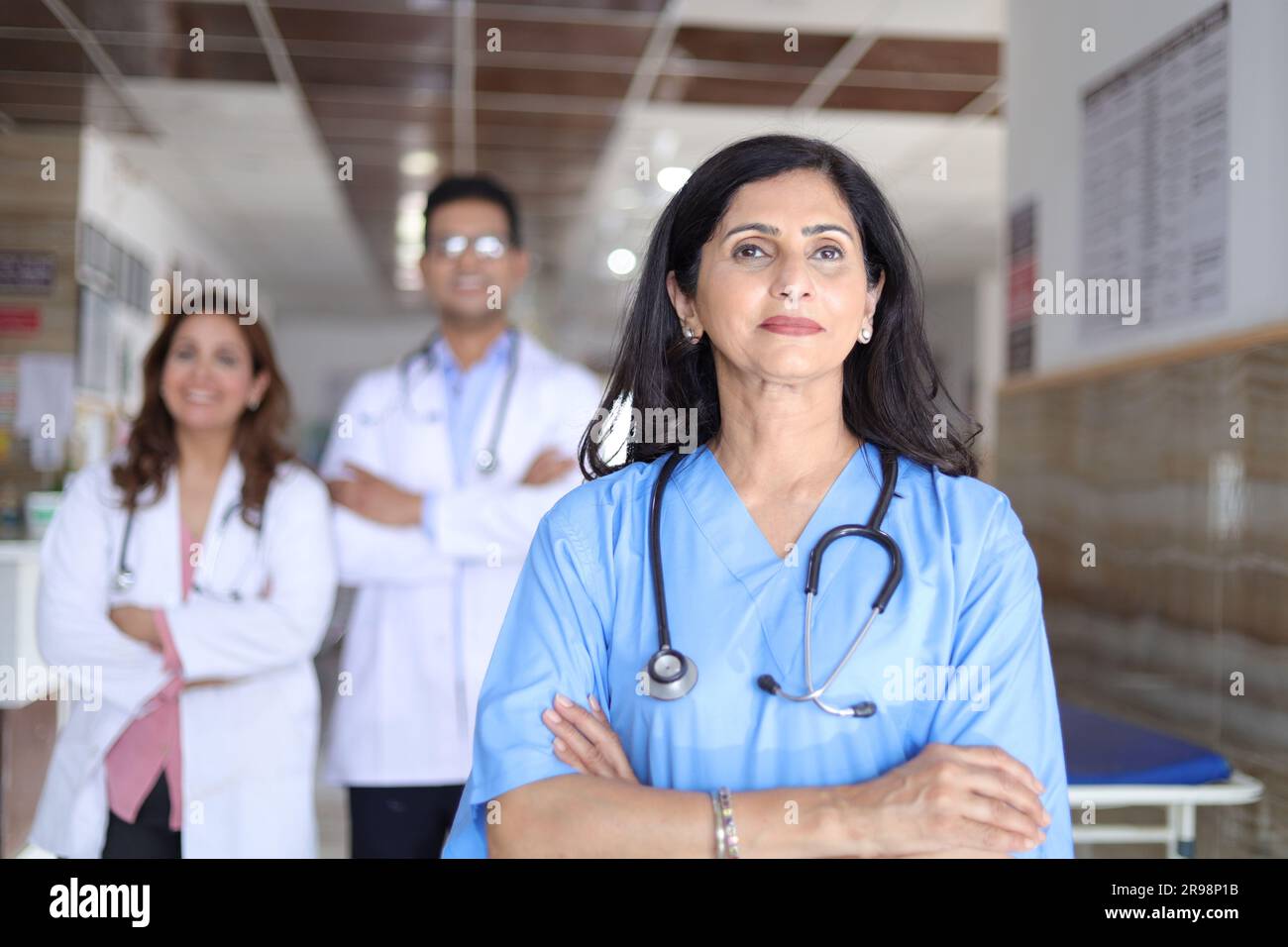 Portrait of Happy Indian Medical Team Standing In Hospital Corridor ...