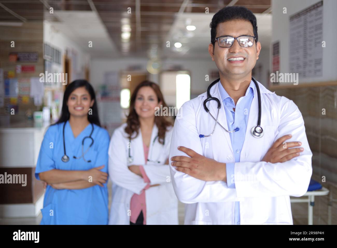 Portrait of Happy Indian Medical Team Standing In Hospital Corridor ...