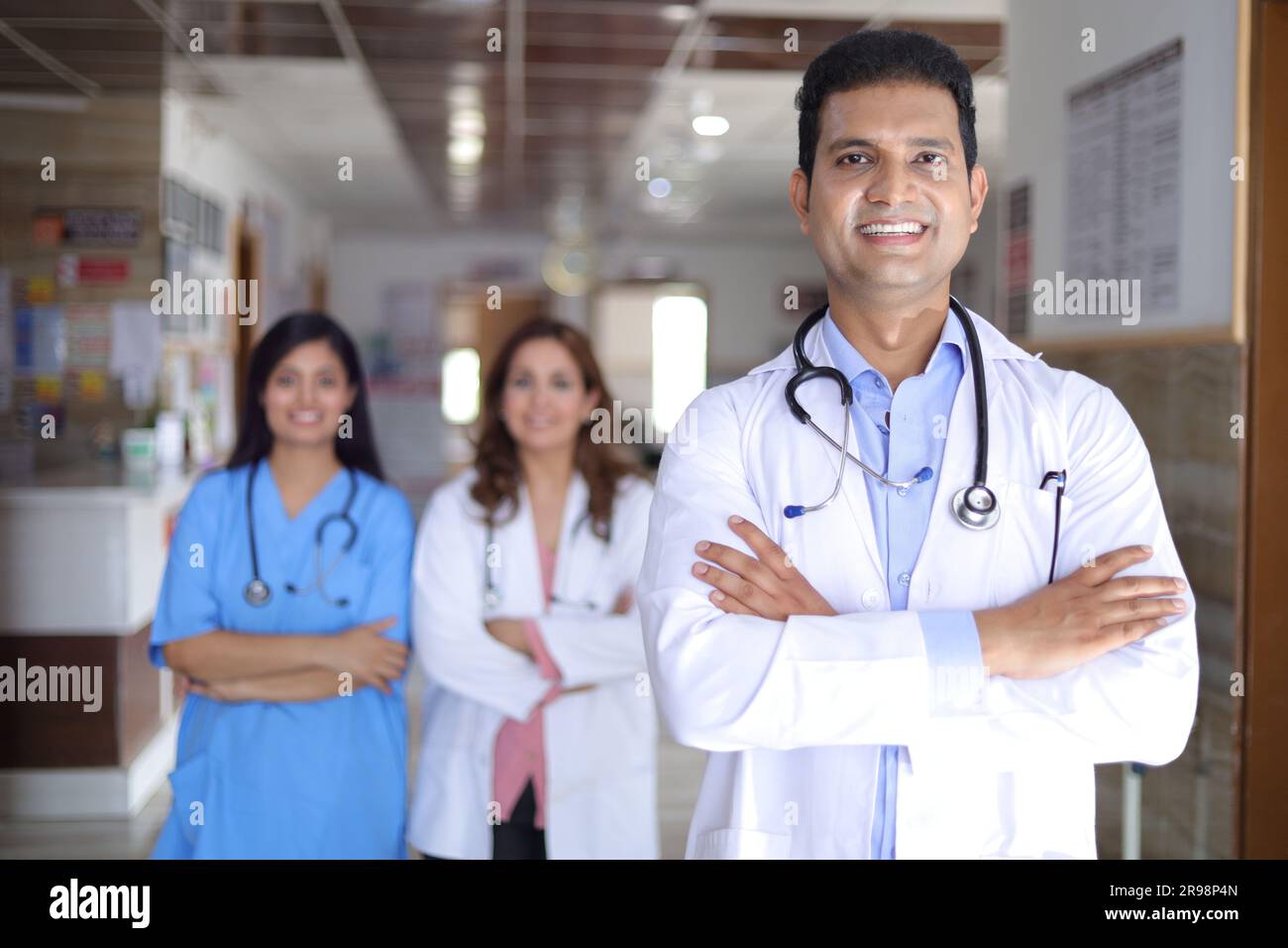 Portrait of Happy Indian Medical Team Standing In Hospital Corridor ...
