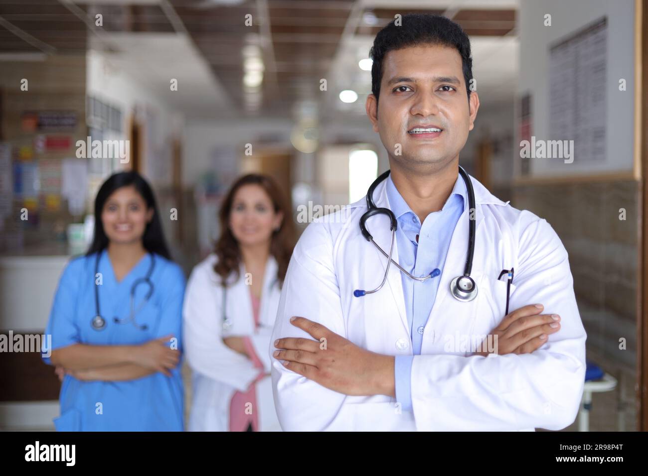 Portrait of Happy Indian Medical Team Standing In Hospital Corridor ...