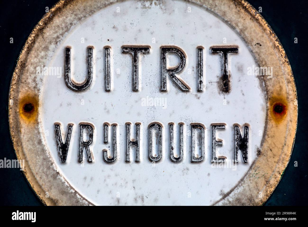 Dutch garage door warning sign. The Dutch text translates as Exit, Keep ...