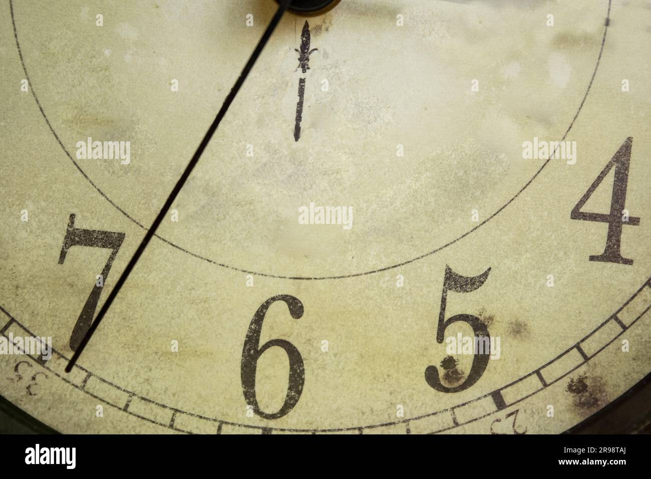 time concept with the face of an old clock and the time written Stock ...