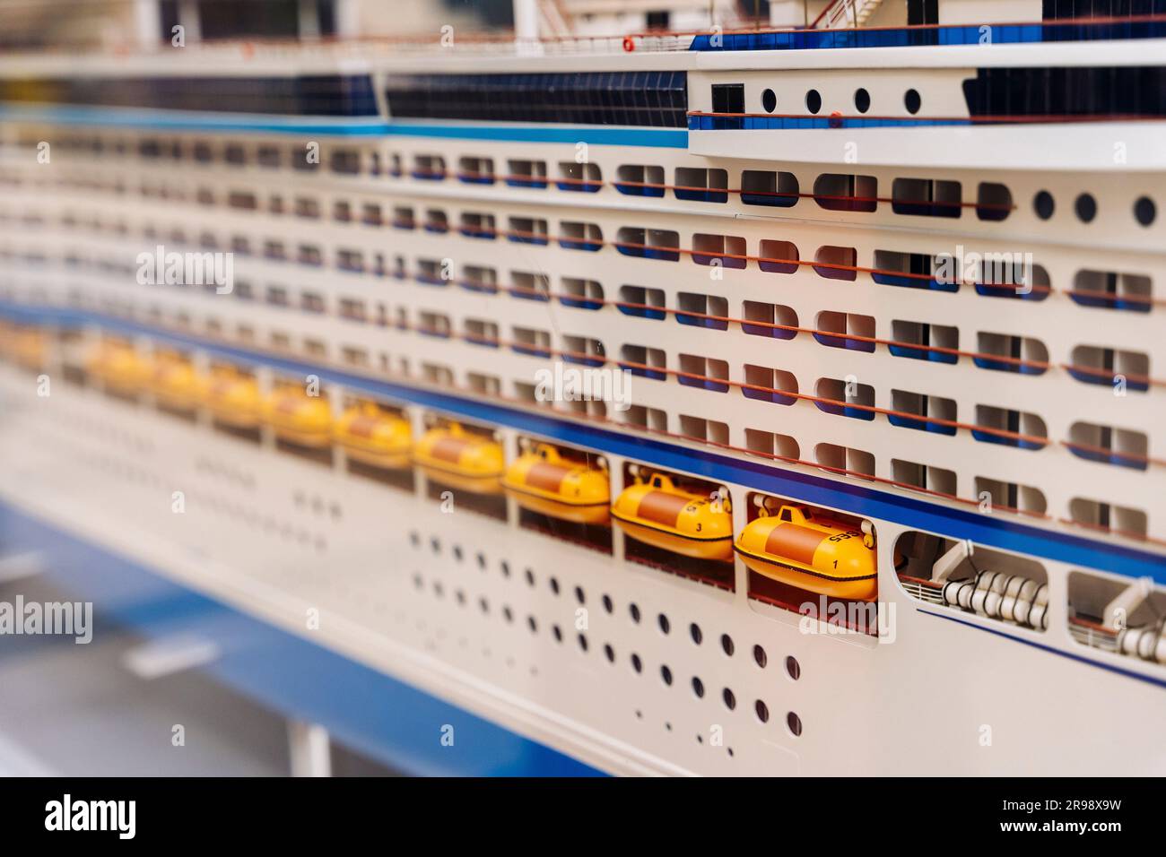 side view of a huge snow-white ocean liner. A large-scale model of a ...
