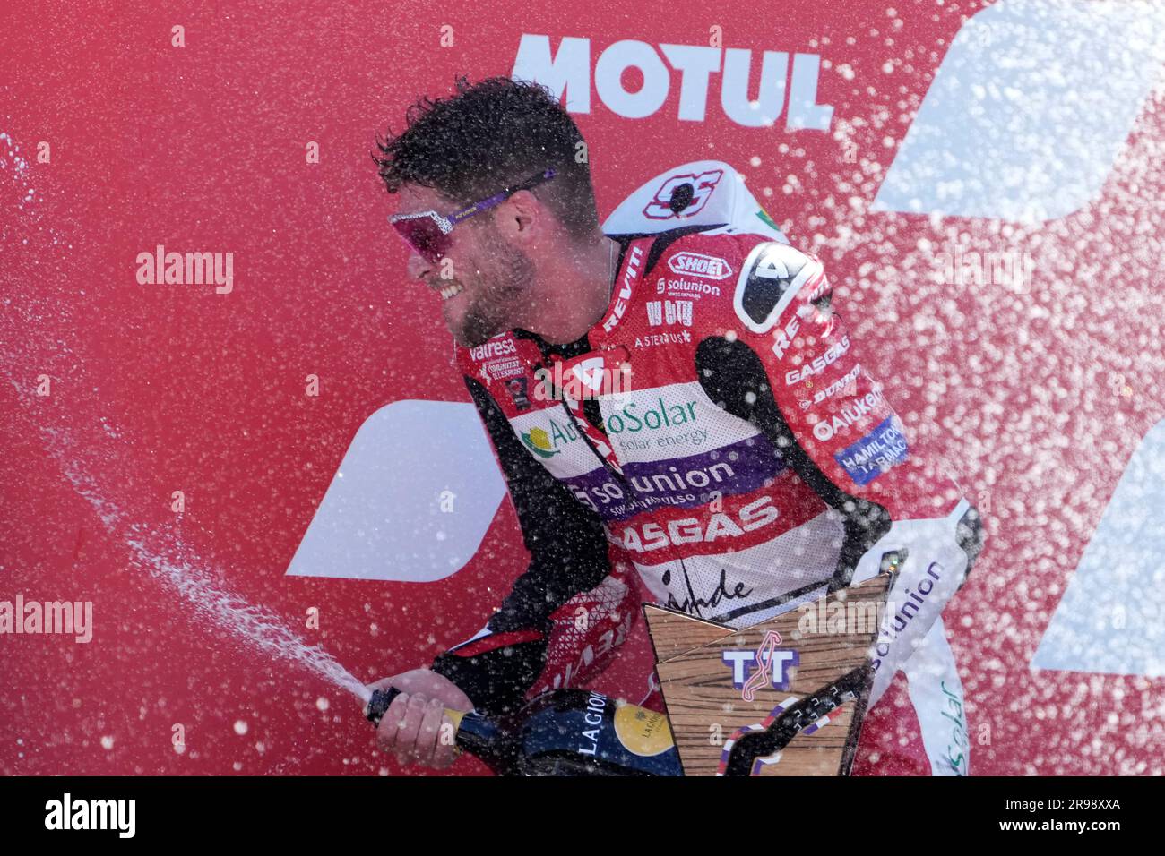 Britain's rider Jake Dixon celebrates after winning the Moto2 race at ...