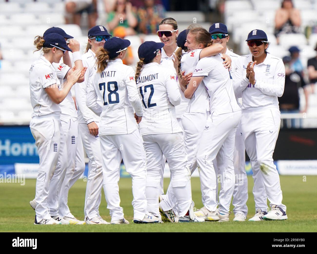 England's Lauren Filer (third right celebrates taking the wicket of ...