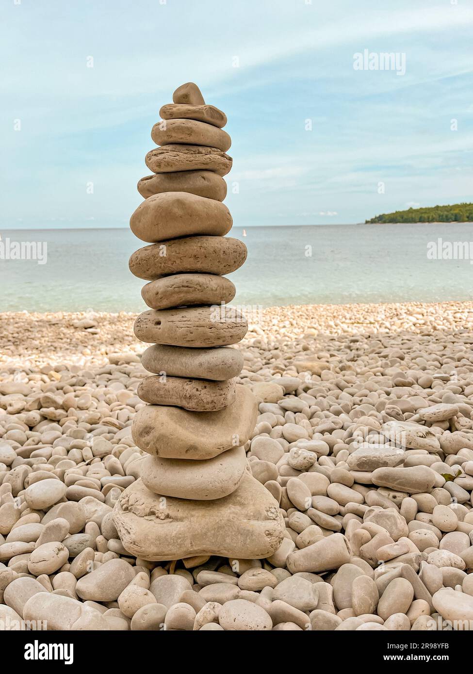 A vertical shot of Stack of rocks at Schoolhouse Beach on Washington ...