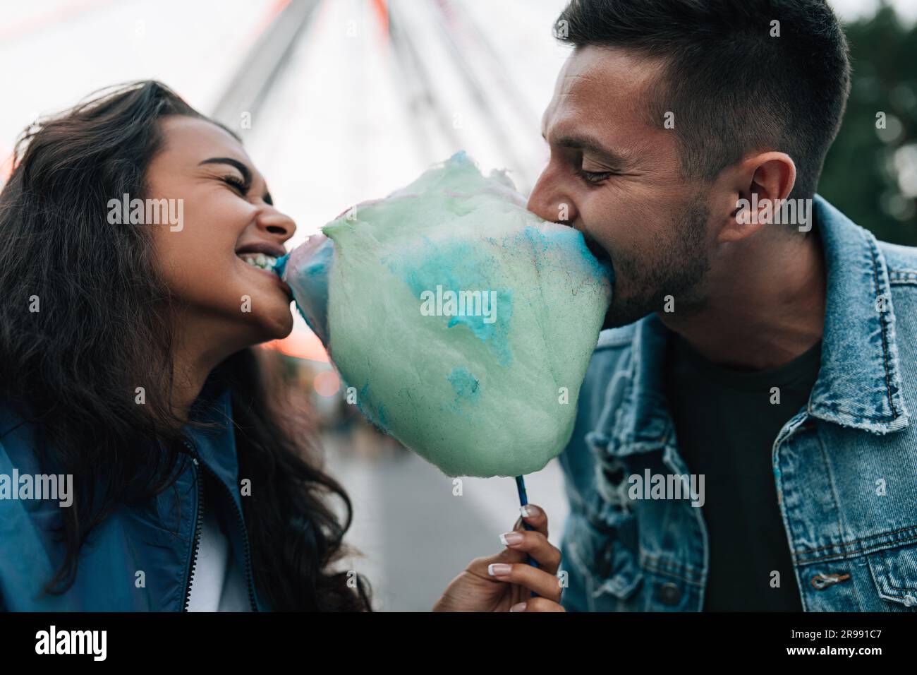 Biting candy hi-res stock photography and images - Alamy