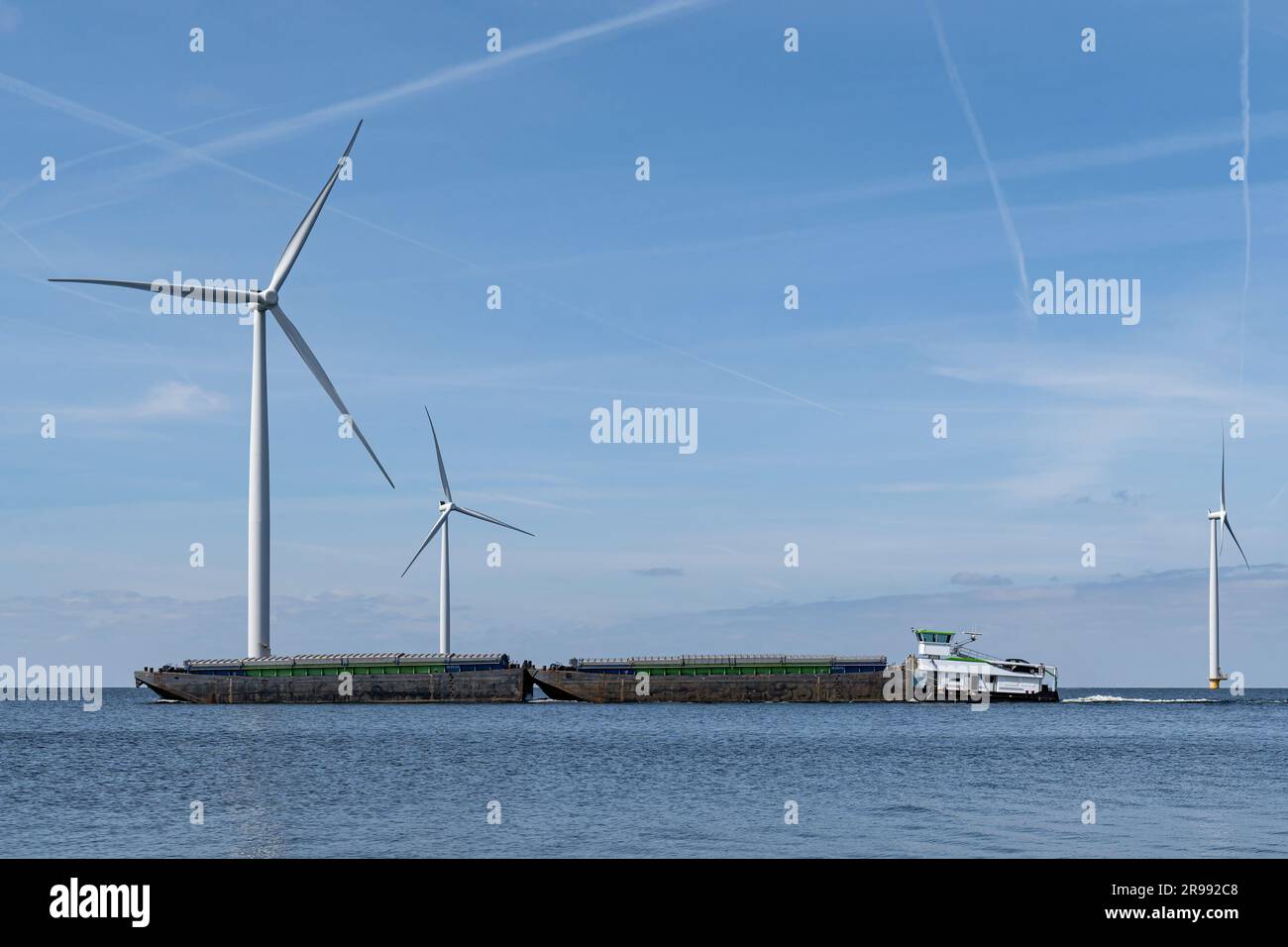 push-tow unit passing offshore wind farm Stock Photo - Alamy