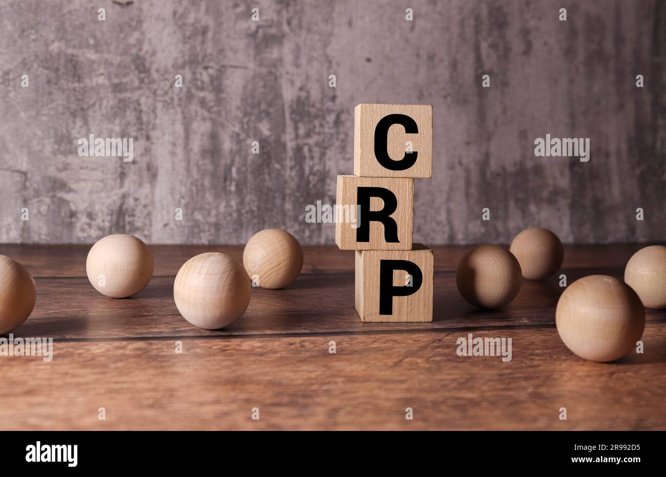 CRP - C-Reactive Protein Test symbol. Wooden cubes with word CRP ...