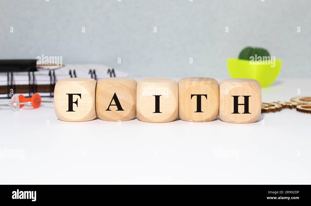 Faith sign made of wood in matte tones Stock Photo - Alamy