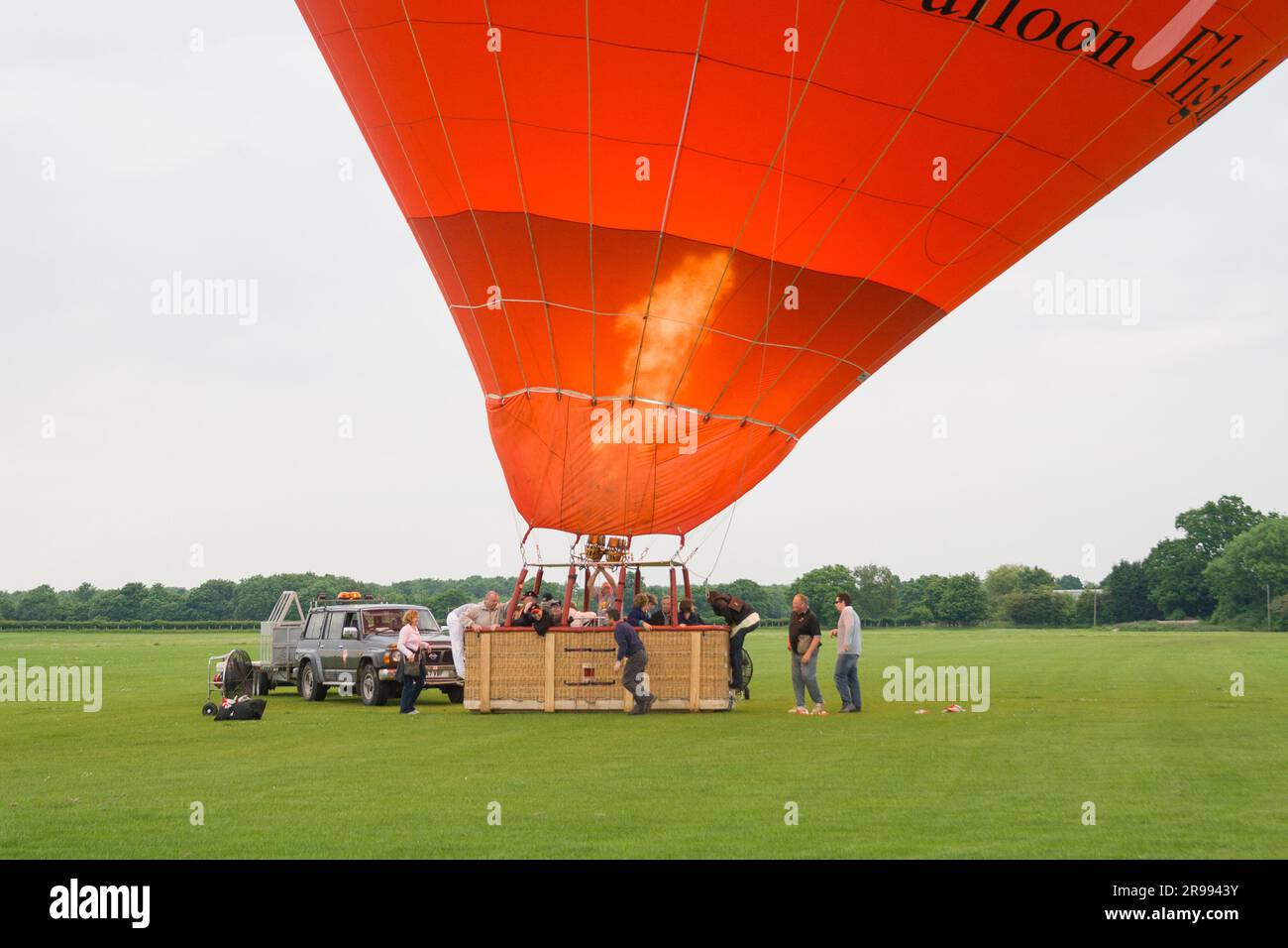 A Virgin Hot Air Balloon at Sywell aerodrome giving a pleasure flight Stock Photo - Alamy