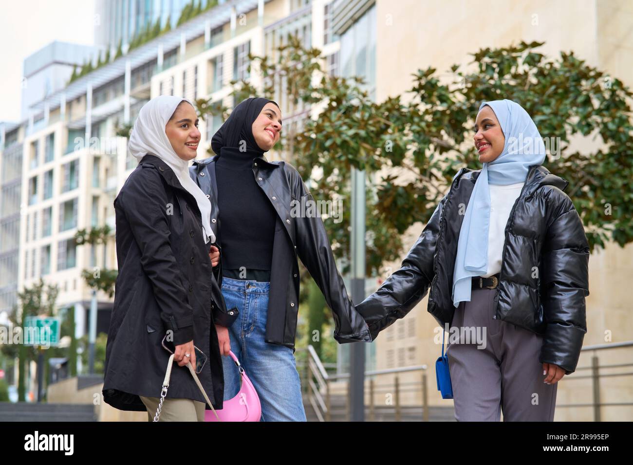 Young muslim women hanging out together Stock Photo - Alamy