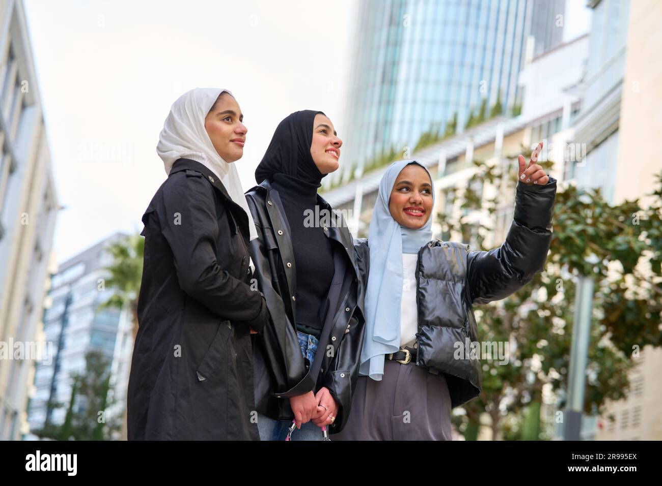 Young muslim women hanging out together Stock Photo - Alamy