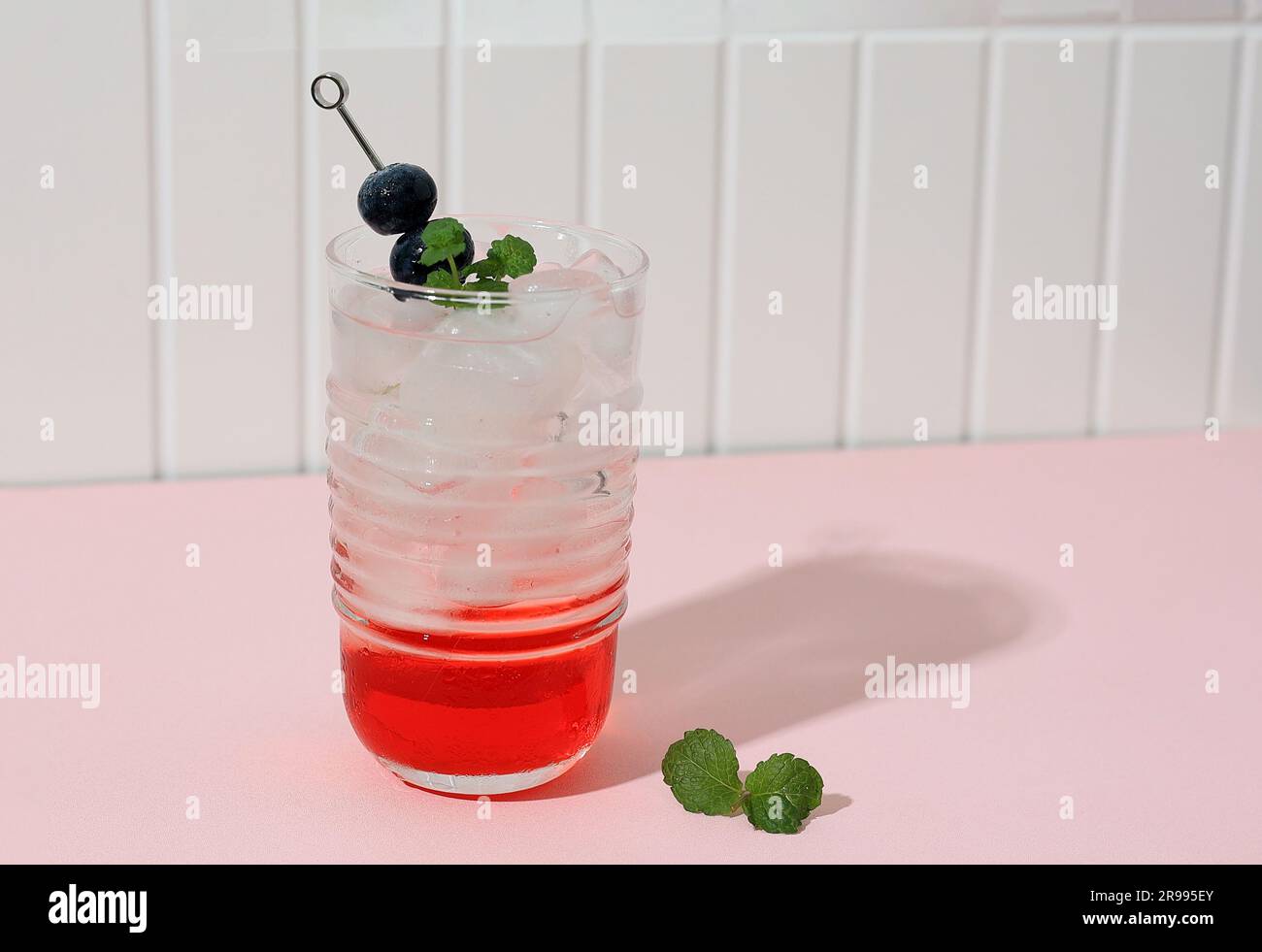 Blueberry Sparkling Red Mojito on Pink Table with Fresh Mint Leaf Stock ...