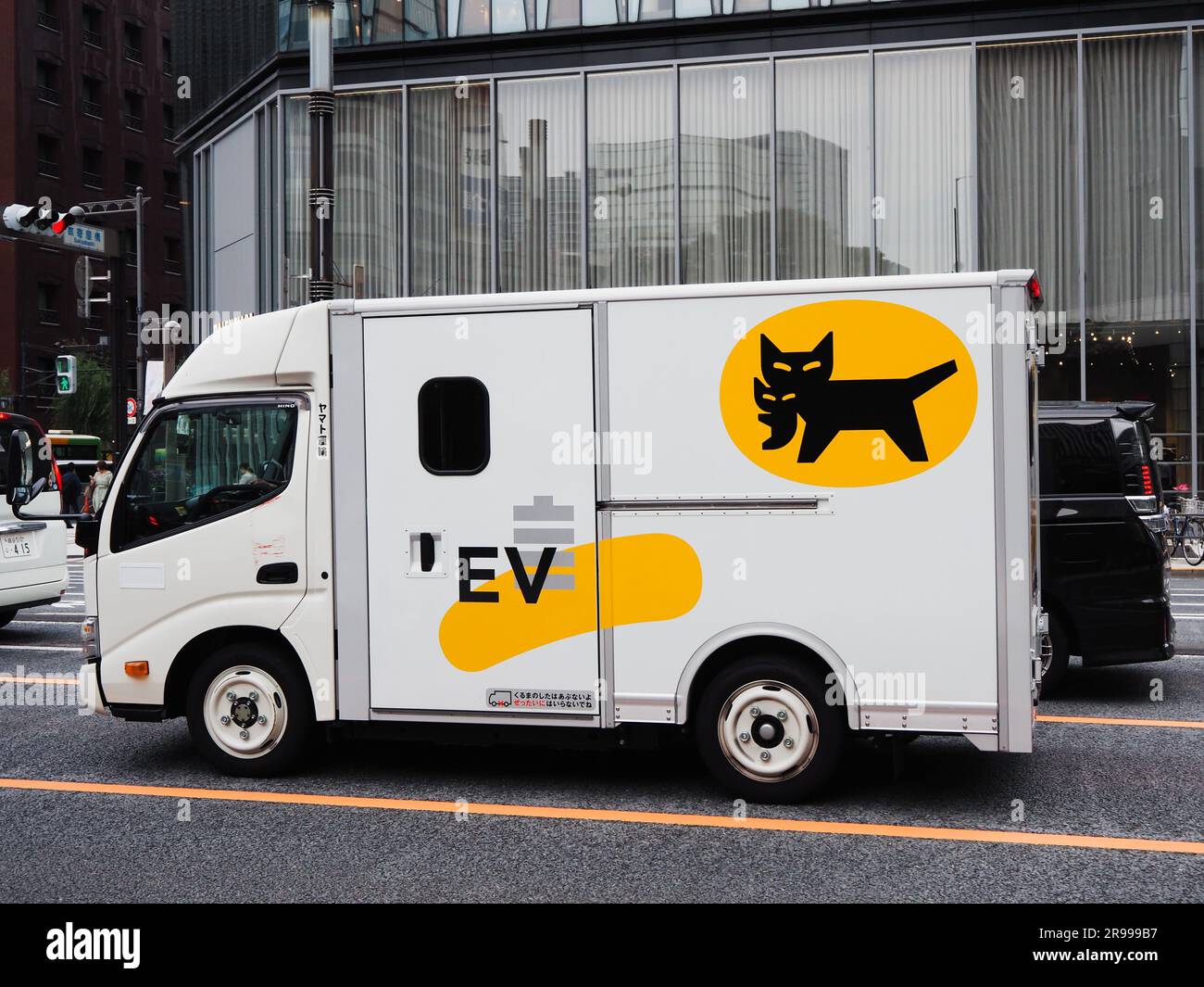 TOKYO, JAPAN - June 13, 2023: A Yamato Transport Company (Kuroneko) electric truck, a Hino Dutro ...