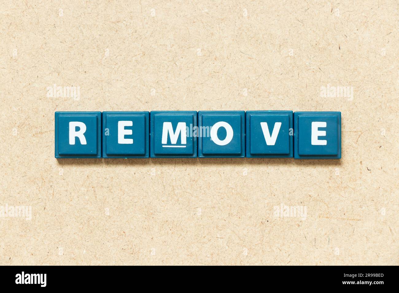 Tile alphabet letter in word remove on wood background Stock Photo - Alamy