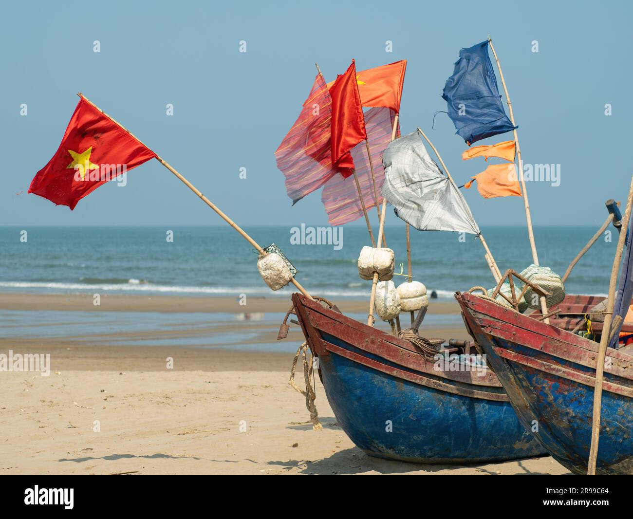 Traditional Vietnamese fishing boats beached at Sam Son beach, Thanh ...
