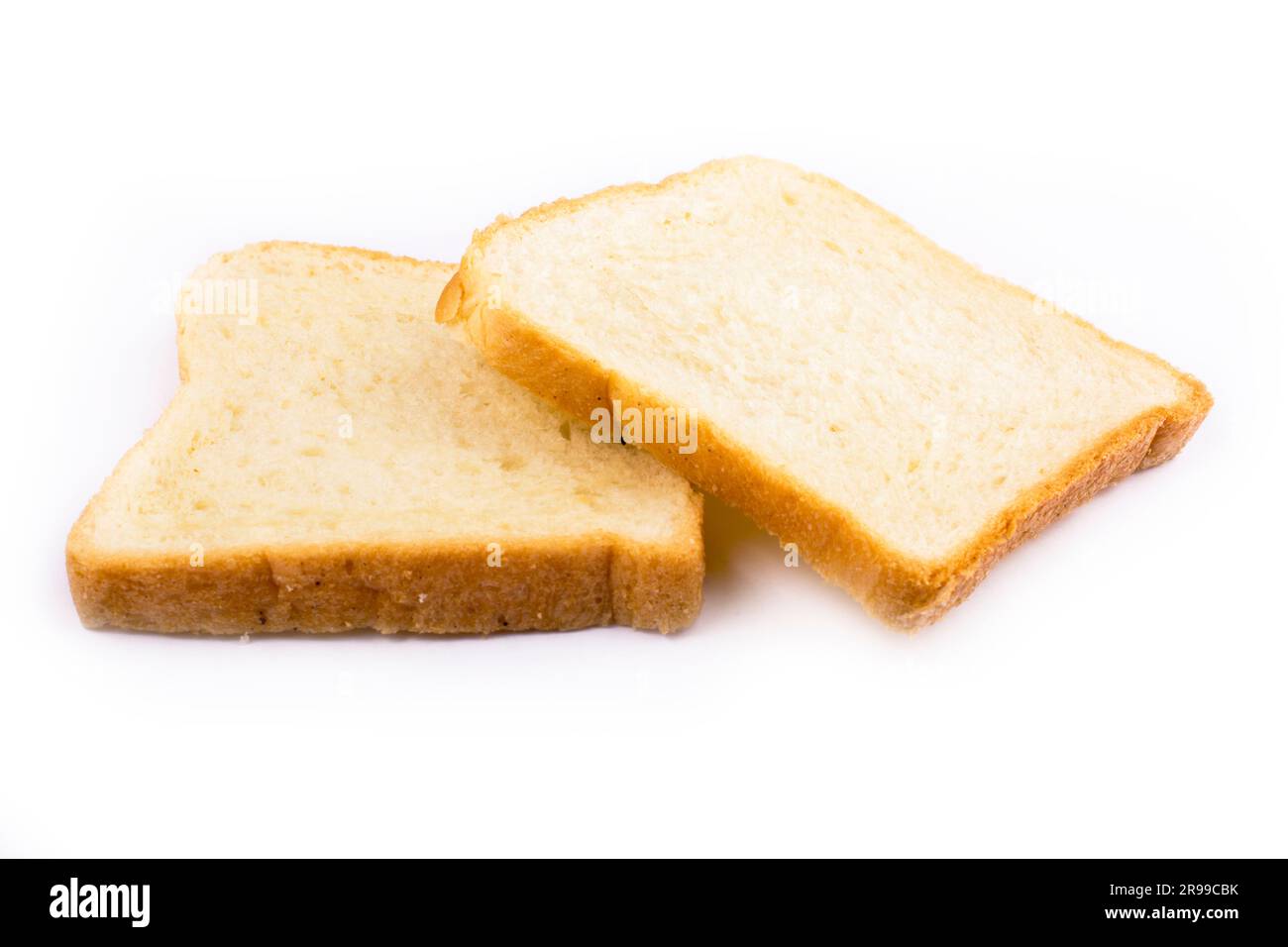 two slices of bread for toast on a white background Stock Photo - Alamy
