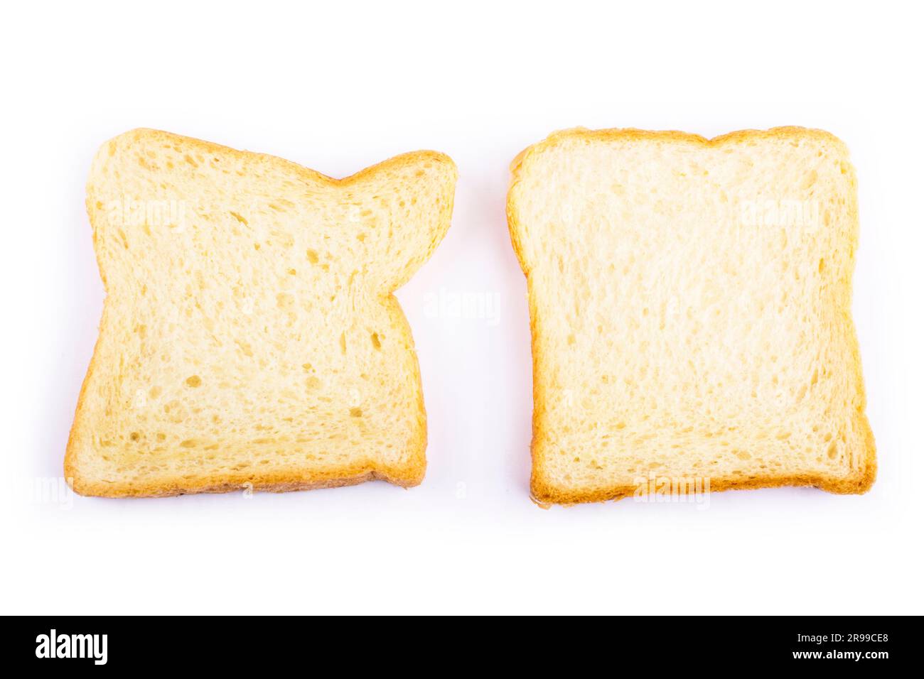 two slices of bread for toast on a white background Stock Photo - Alamy