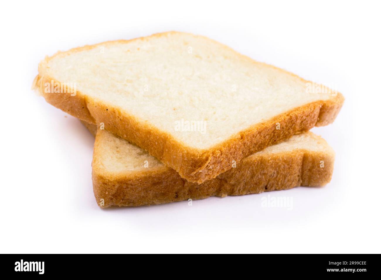 two slices of bread for toast on a white background Stock Photo - Alamy